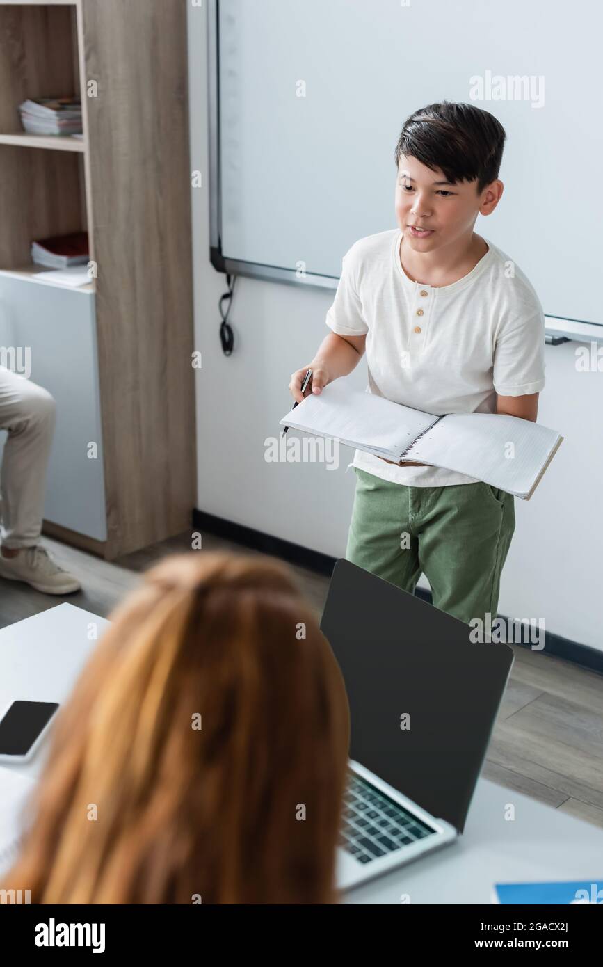 Asian teen boy talking hi-res stock photography and images - Alamy