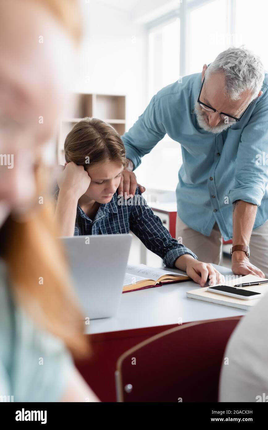 Sad teacher classroom hi-res stock photography and images - Alamy