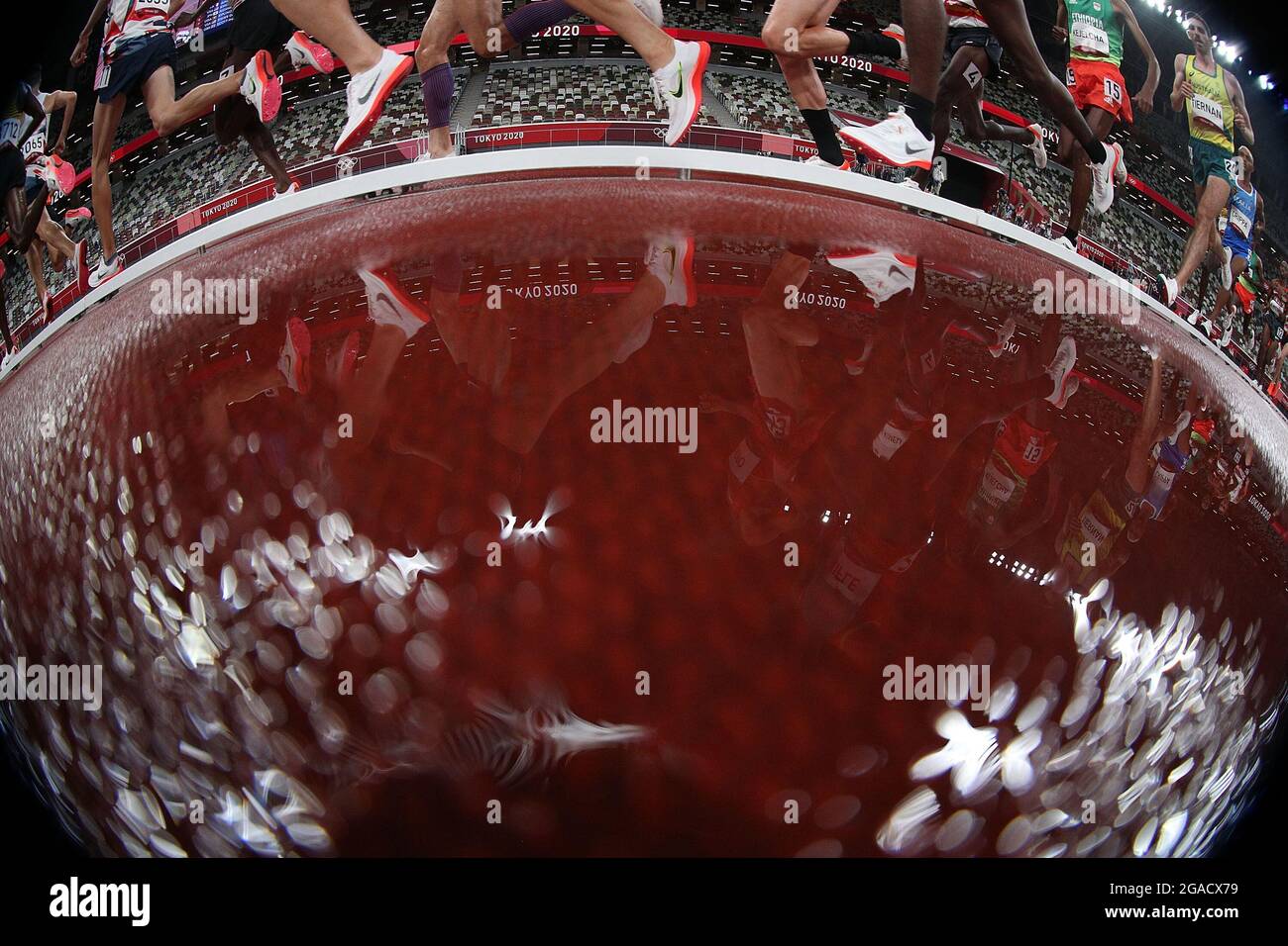 Tokyo, Japan. 30th July, 2021. Athletes compete during the men's 10000m ...