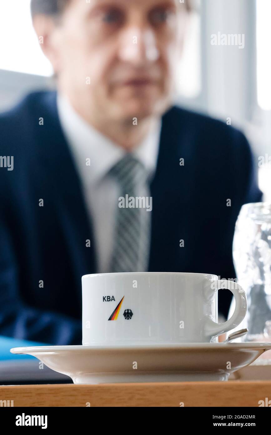 Flensburg, Germany. 28th July, 2021. A cup with the logo of the Federal ...