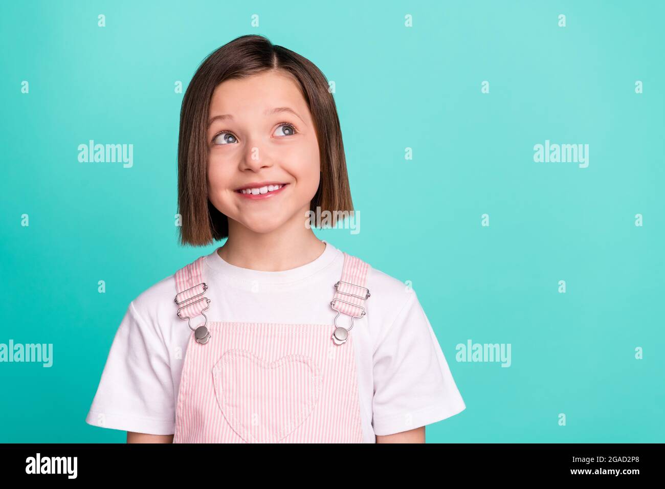 Photo of dreamy happy cheerful positive little girl imagine think ...