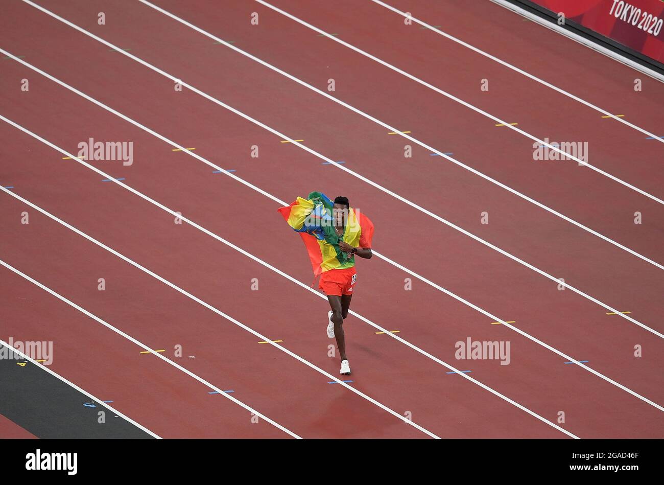 Tokyo, Japan. 30th July, 2021. Selemon Barega of Ethiopia celebrates ...