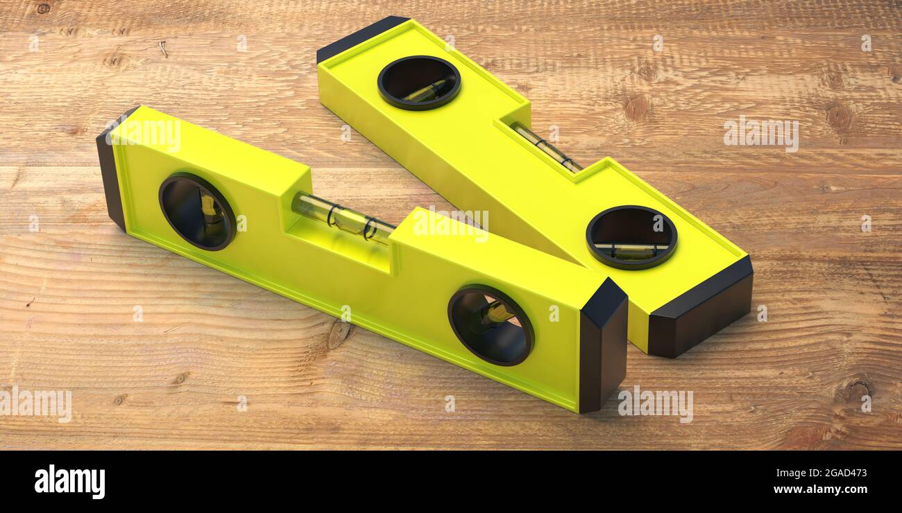 Level instrument on wooden table background. Construction carpenter ...