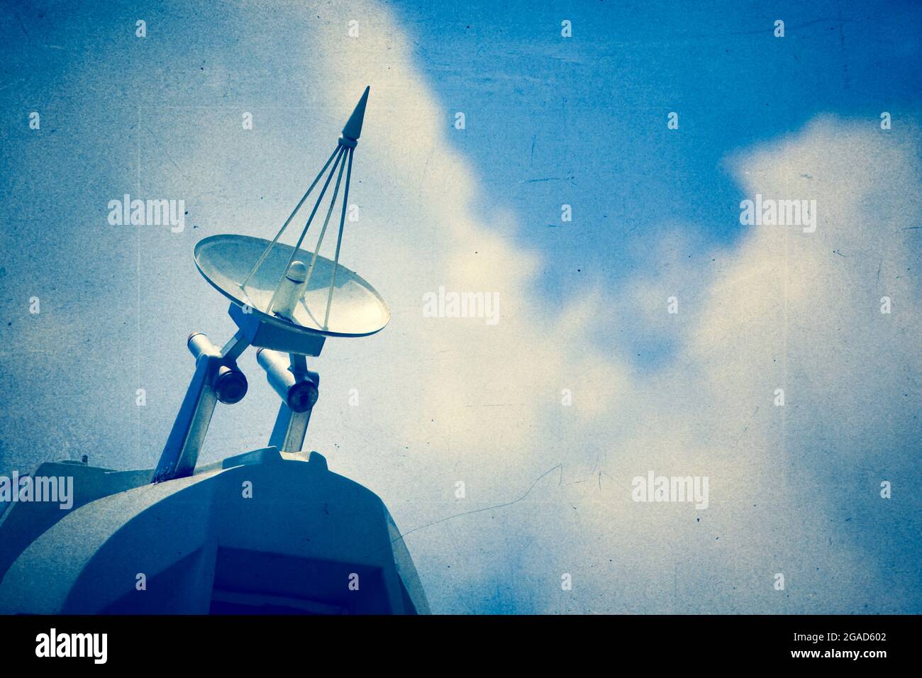 Fake satellite disk with blue sky in background, vintage style Stock ...