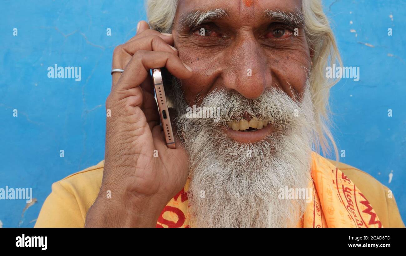 Indian old man talking hi-res stock photography and images - Alamy