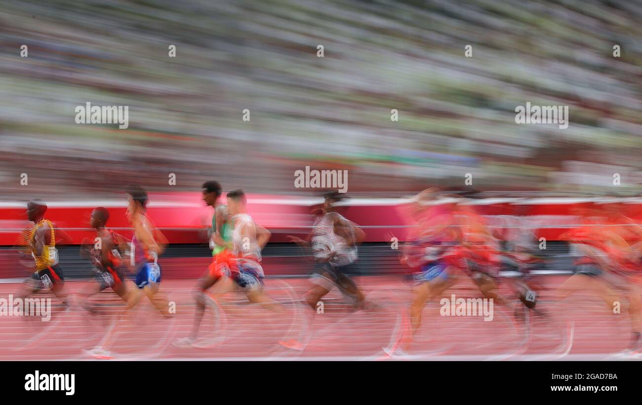 Tokyo, Japan. 30th July, 2021. Athletes compete during the men's 10000m ...
