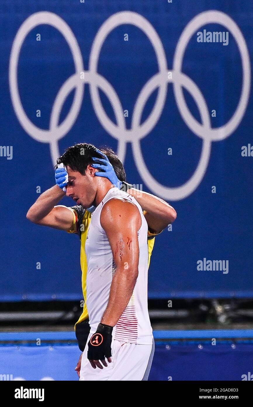Belgium's Alexander Hendrickx leaves the pitch after being injured ...