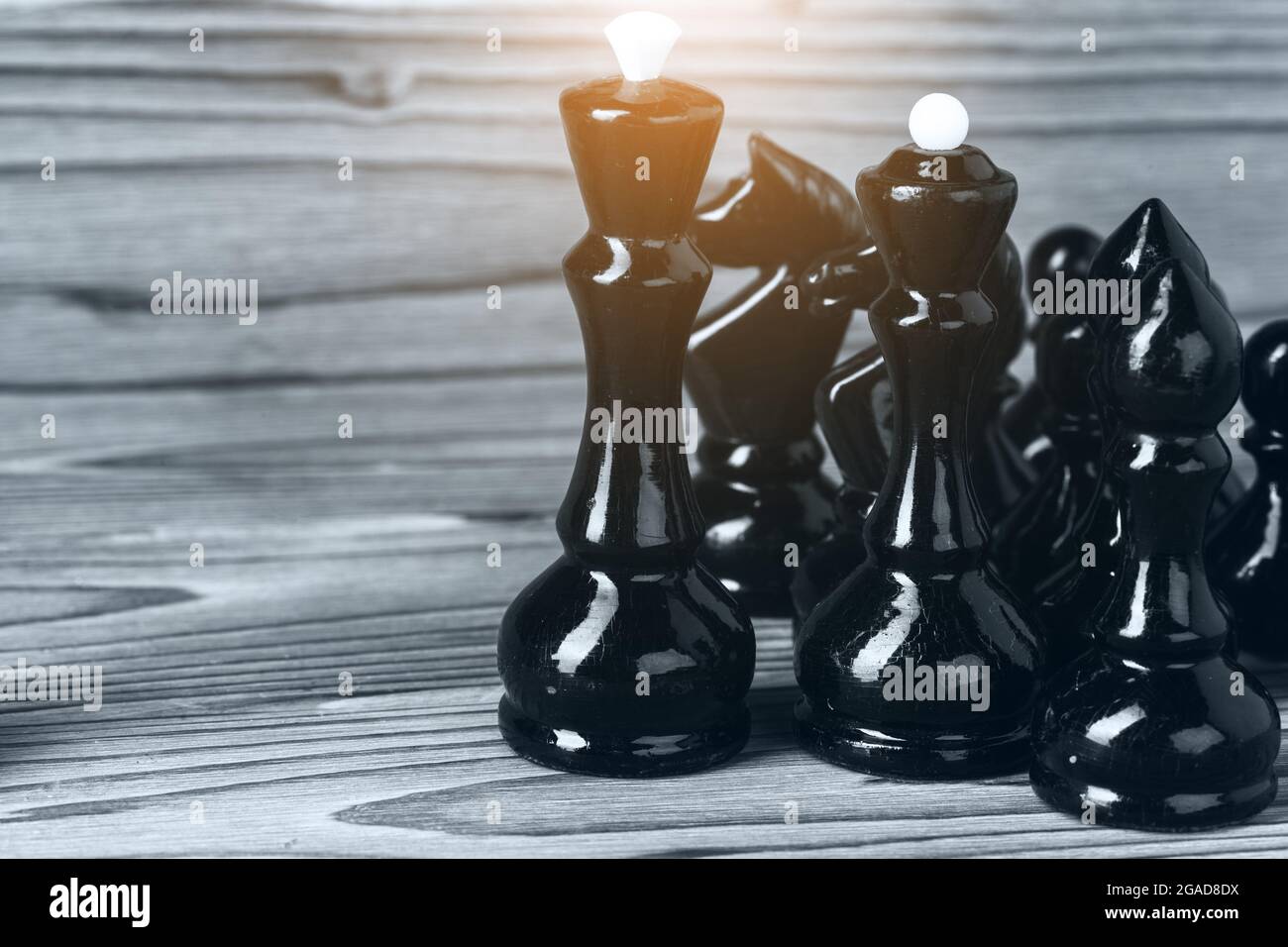 Frame of chess pieces on a rustic wooden background Stock Photo - Alamy