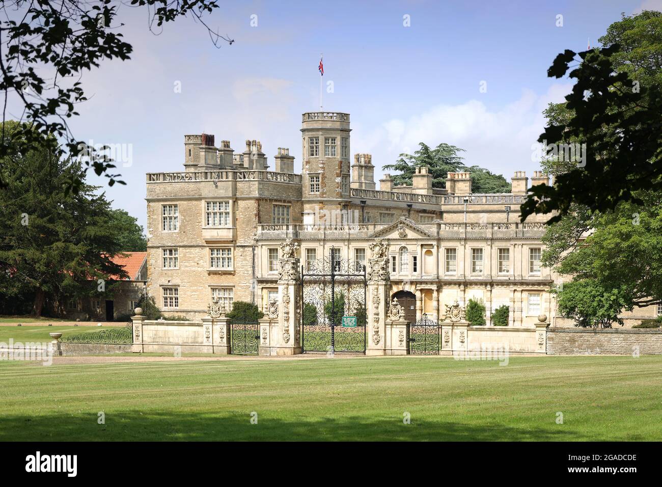 Castle Ashby House, a seventeenth century country house, on a sunny day ...