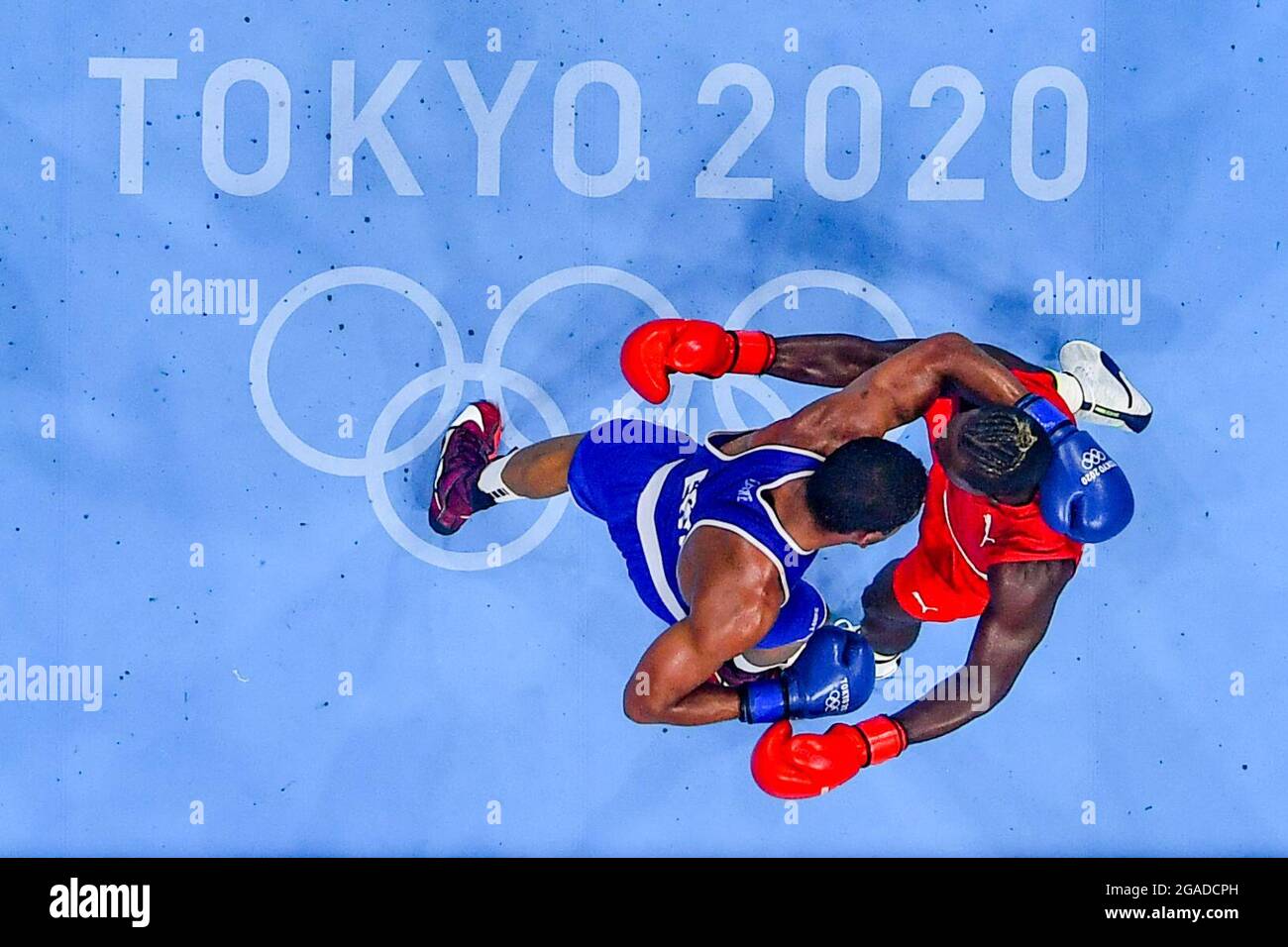Tokyo, Japan. 30th July, 2021. Julio la Cruz (R) of Cuba competes with ...