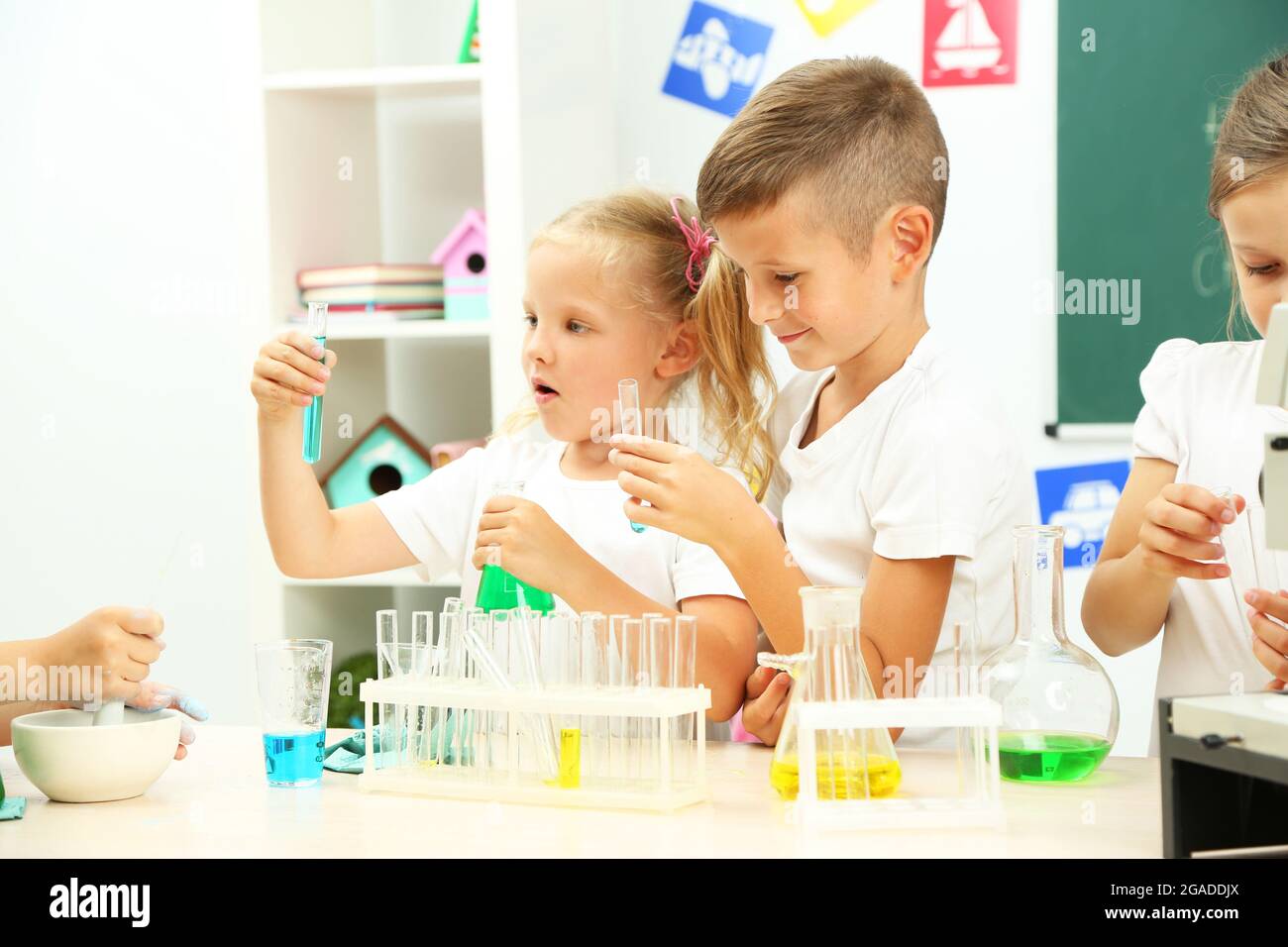 Cute pupils doing biochemistry research in chemistry class Stock Photo ...