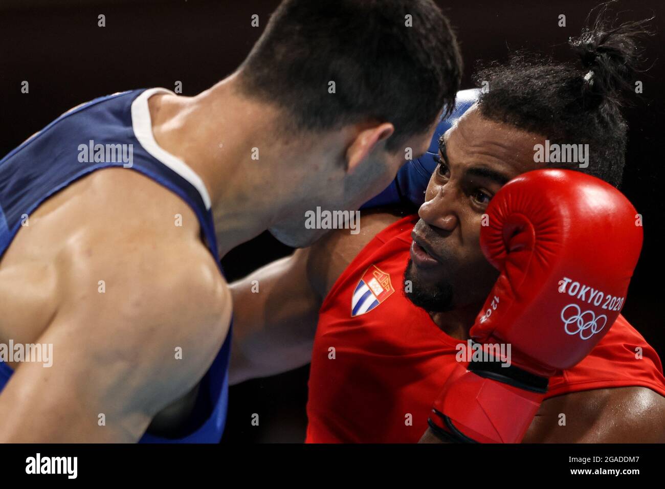 Tokyo, Japan. 30th July, 2021. Arlen Lopez (R) of Cuba competes with ...
