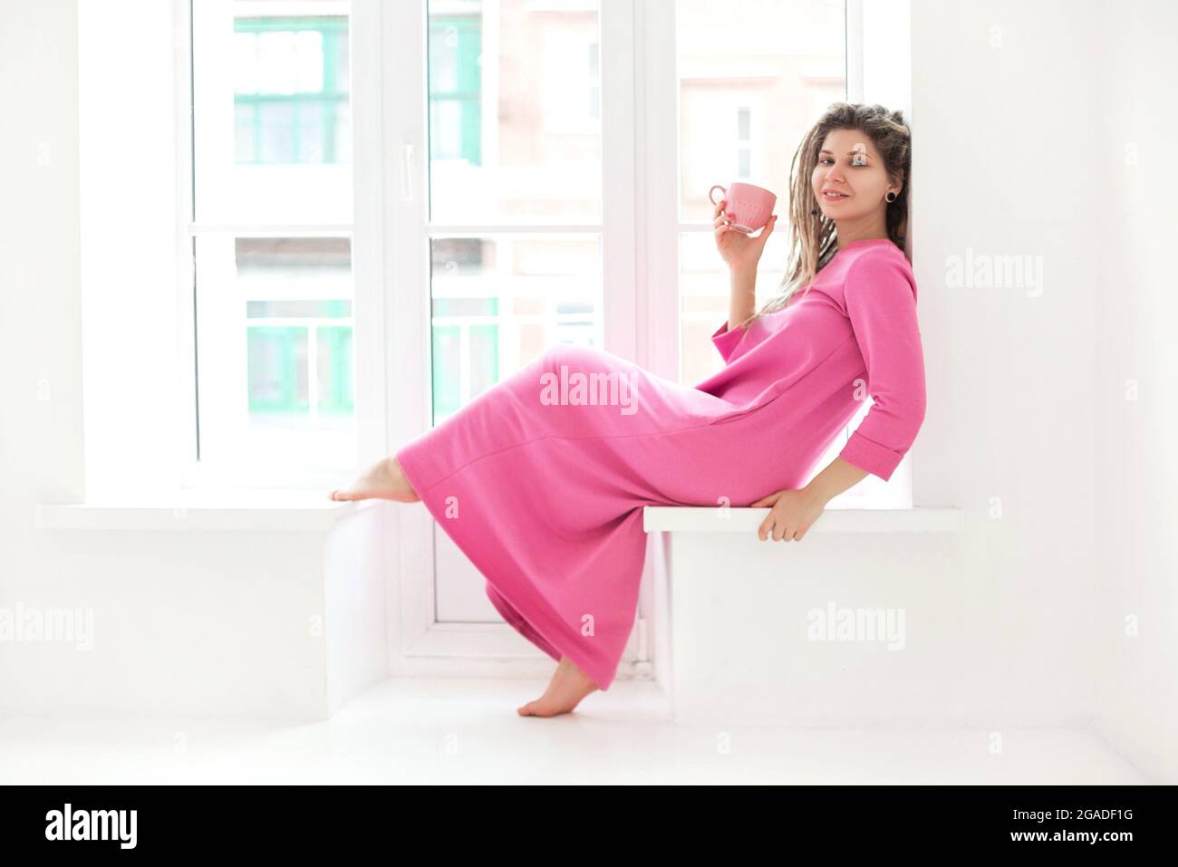 Woman sitting on loo hi-res stock photography and images - Alamy