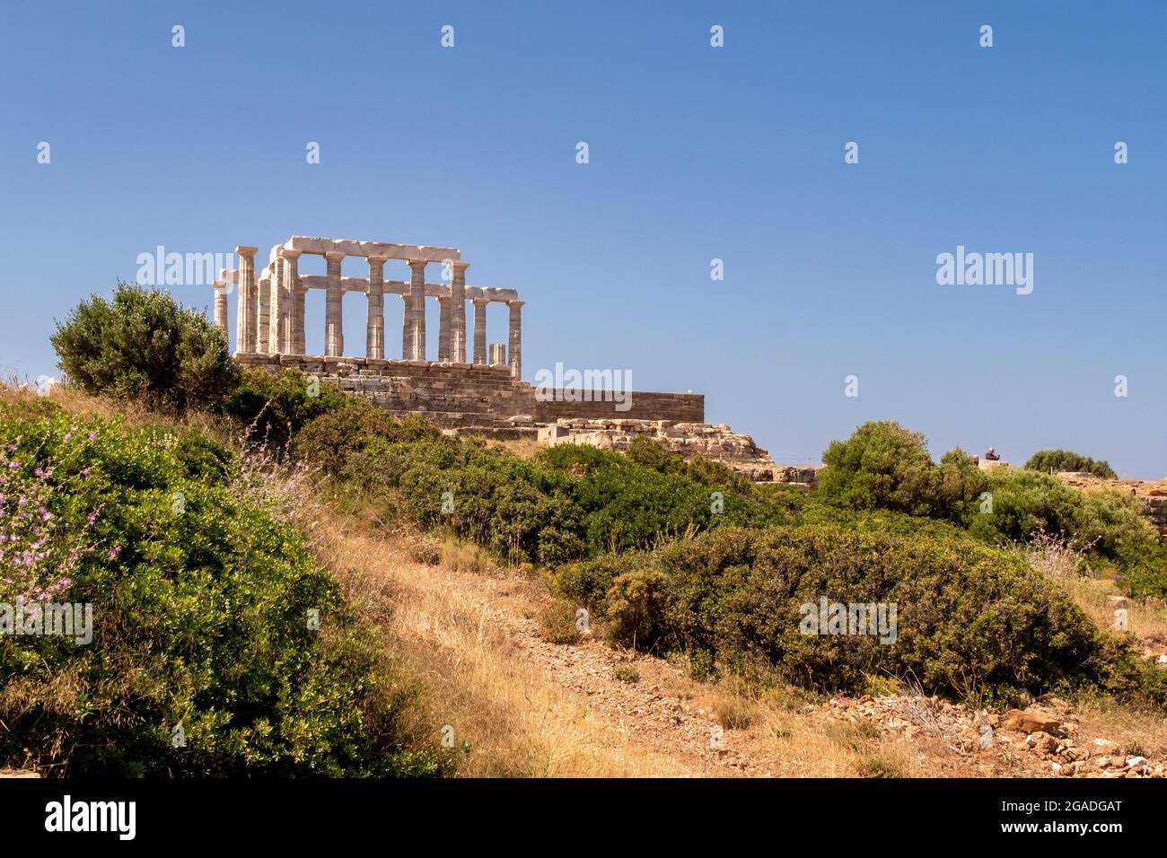The ancient Greek Temple of Poseidon at Cape Sounion, doric columns and ...
