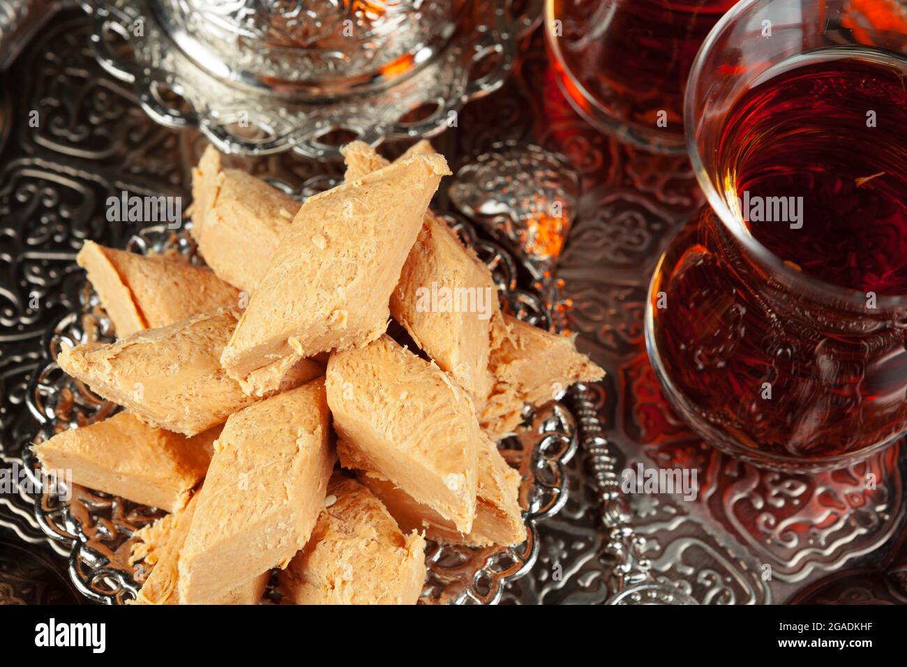 Bowl with pieces of turkish delight lokum and black tea Stock Photo - Alamy