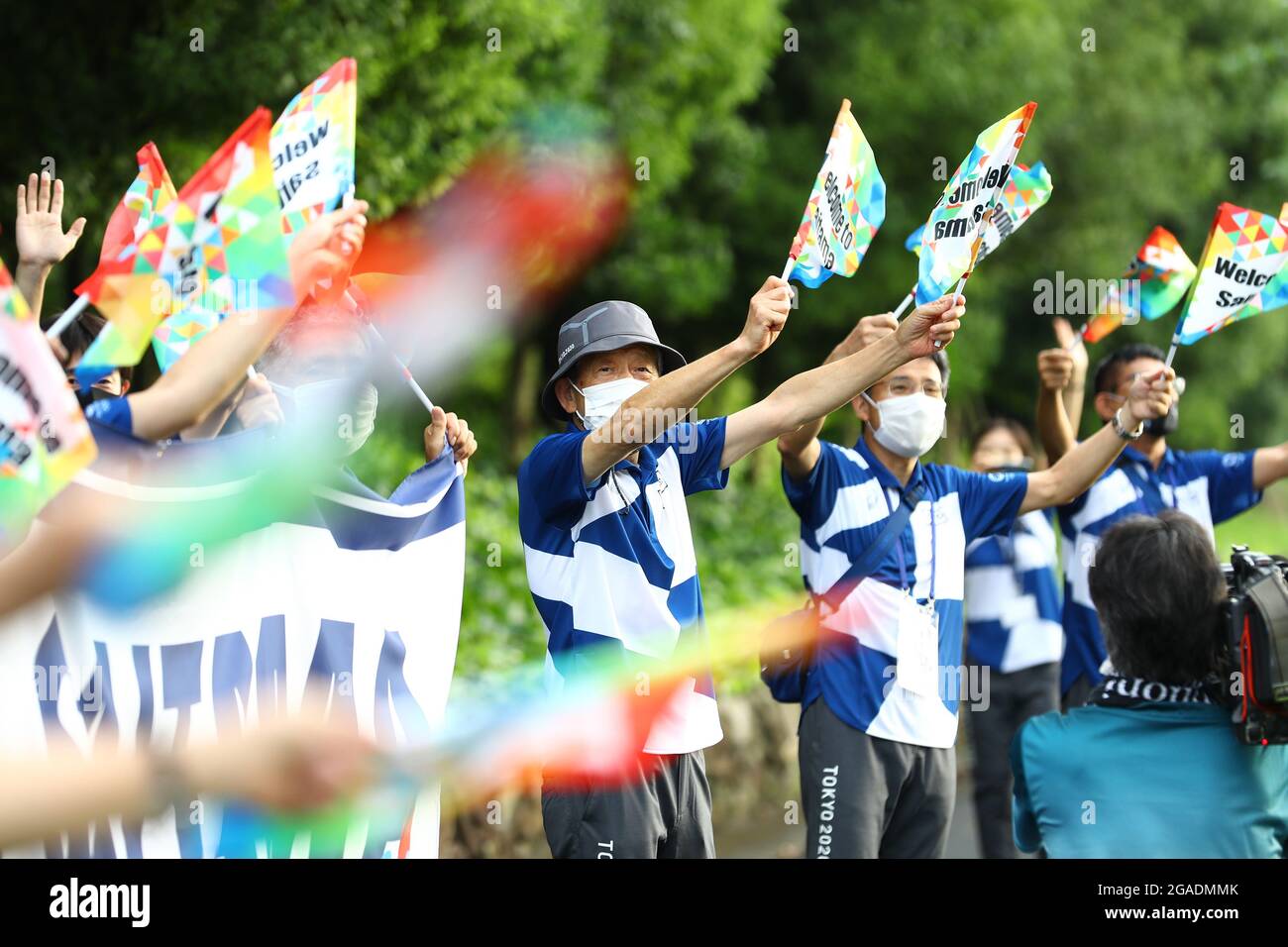 City Volunteers, JULY 30, 2021: Tokyo 2020 City Volunteers cheer while ...