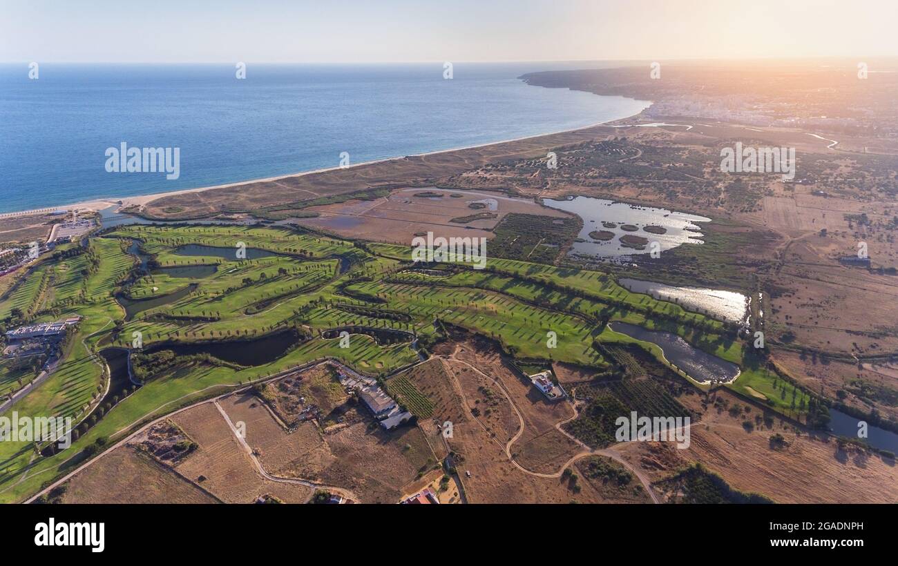 Green golf courses by the sea. Salgados beach. Portugal, Albufeira ...