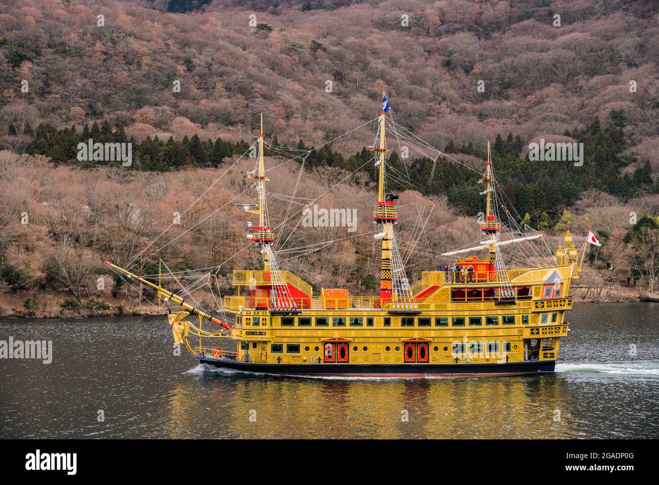 Yellow pirate ship in Japan. Tourists sail across Lake Ashi in Fuji ...