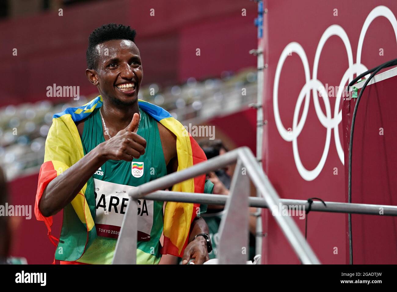 Tokyo, Japan. 30th July, 2021. Selemon Barega of Ethiopia, celebrates ...
