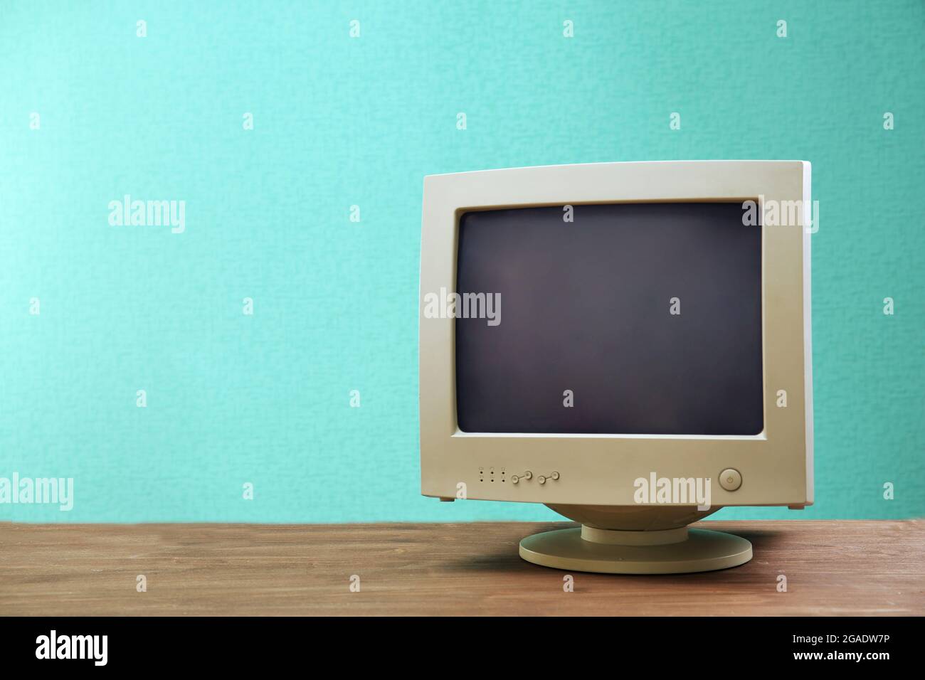 Obsolete computer set on light blue background Stock Photo - Alamy