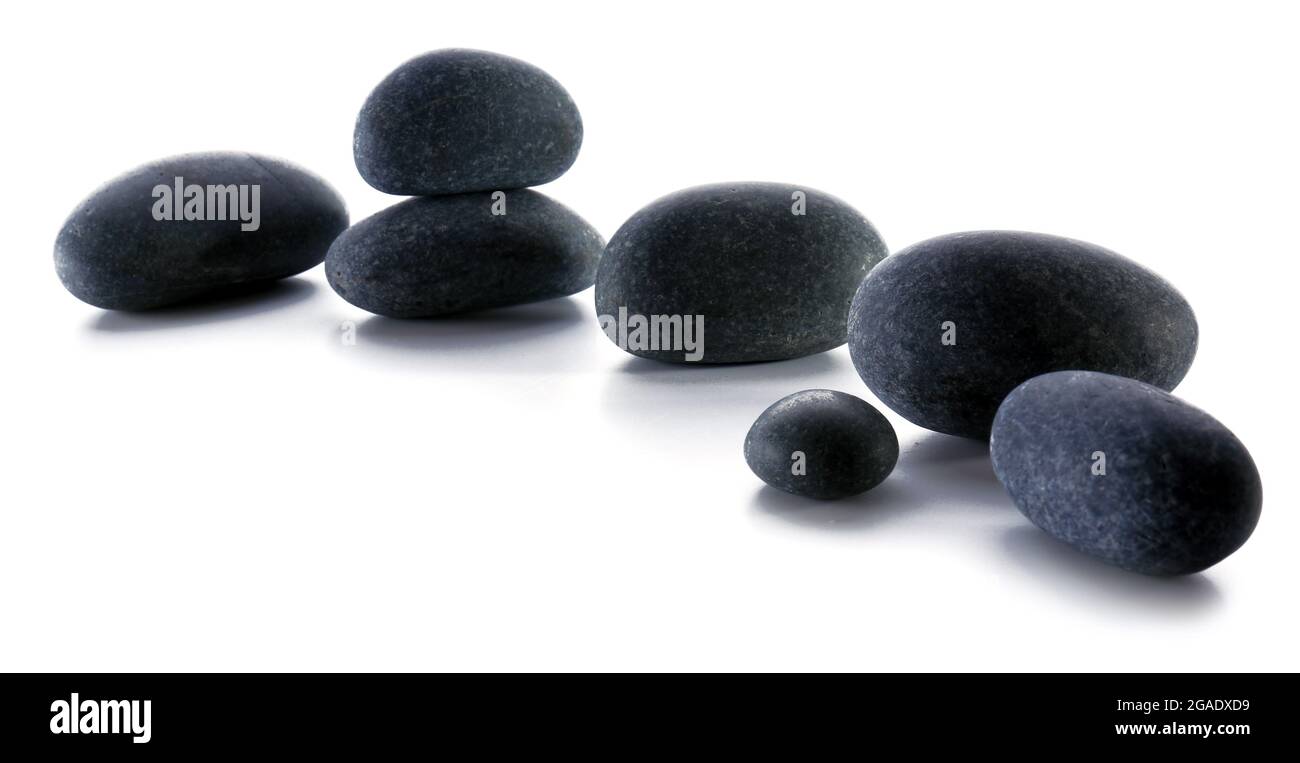 Spa stones isolated on white Stock Photo - Alamy