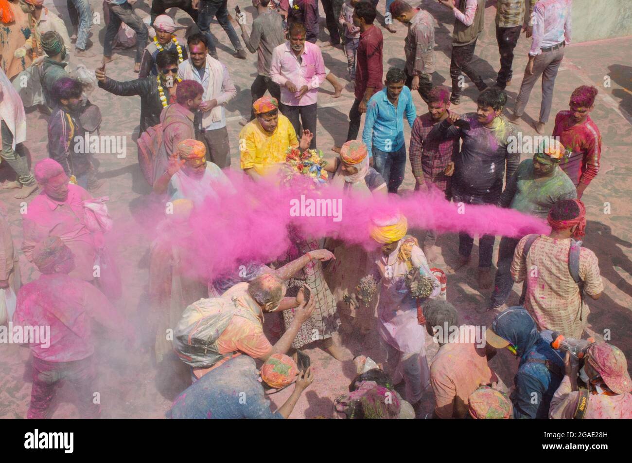 Smoke of "Gulal", powder color is billowing in Holi festival Stock ...