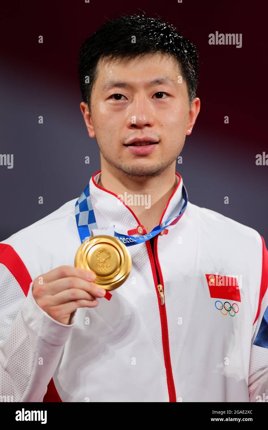 Tokyo, Japan. 30th July, 2021. Ma Long shows his Gold medal during the ...