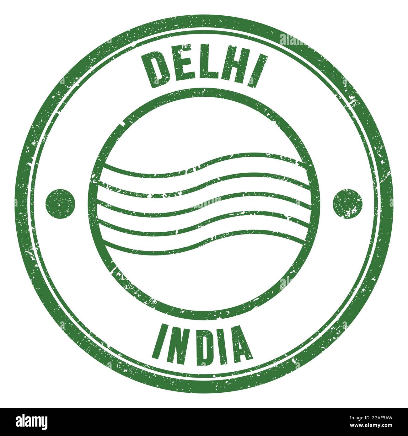 DELHI - INDIA, words written on green round postal stamp Stock Photo ...