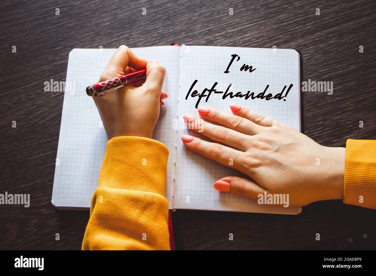International left-handers day. Holiday August 13th. Woman lefty writes ...