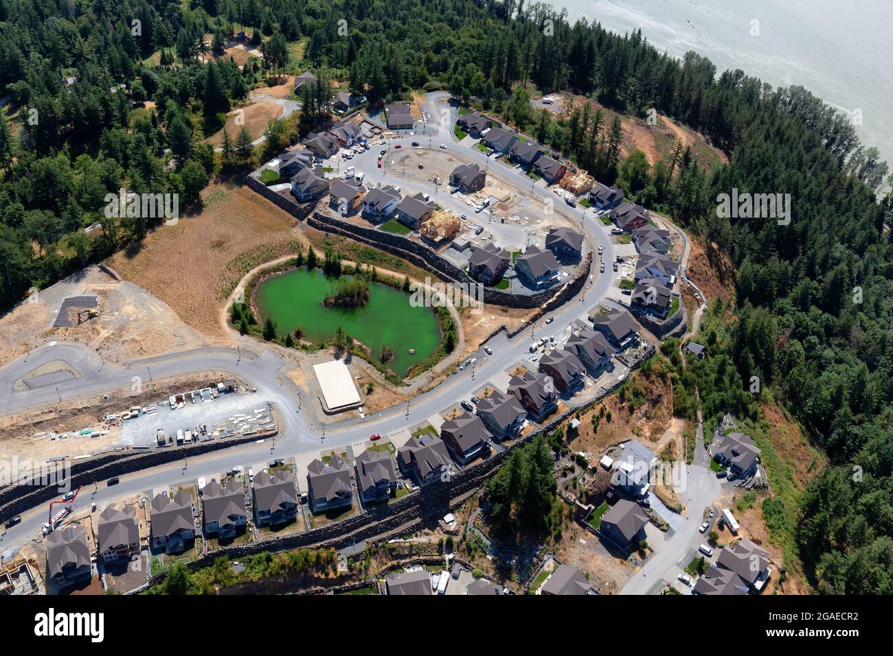 Aerial View of Residential Homes and Construction Site on a hill Stock ...