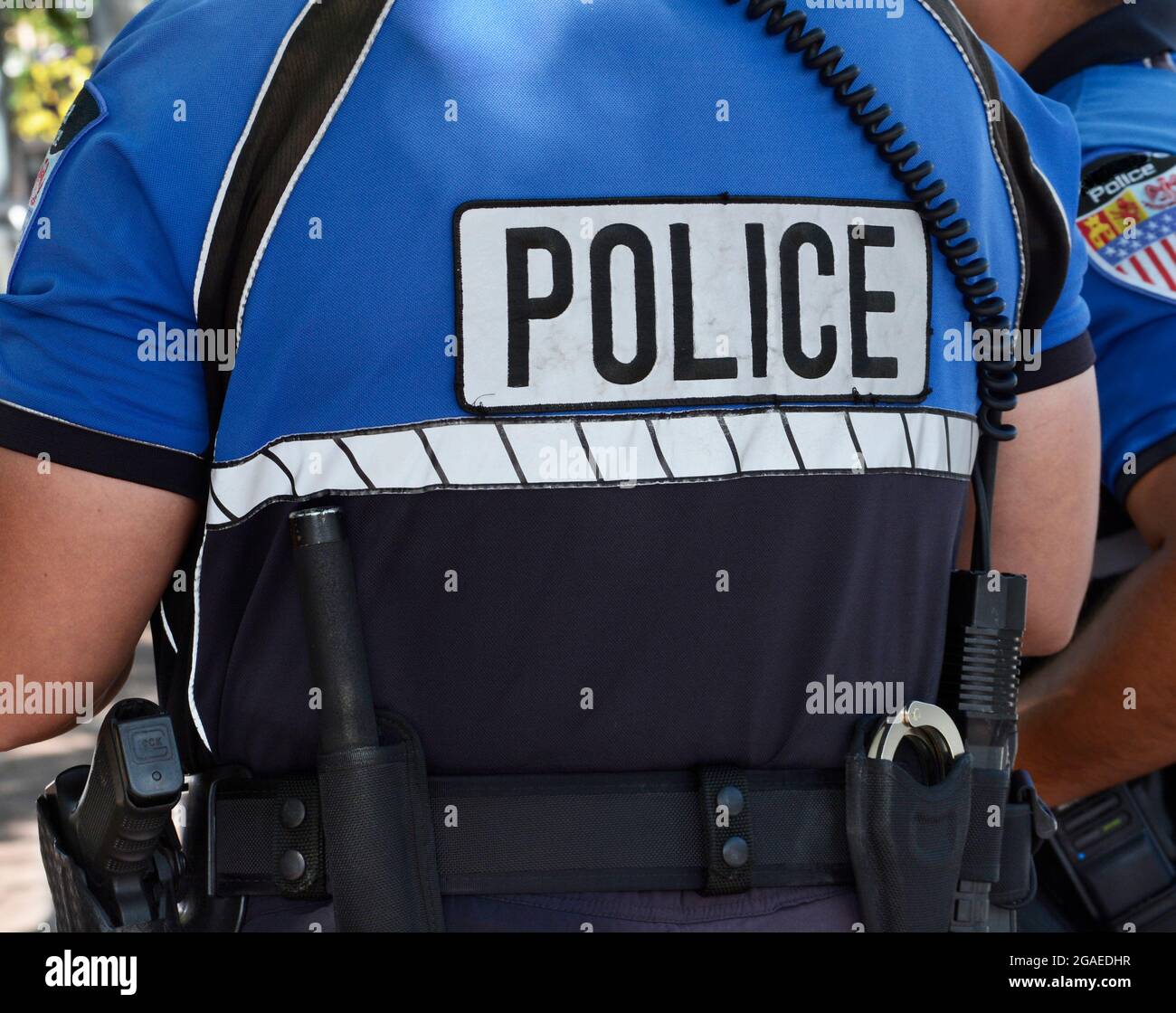 Two police officers stand in hi-res stock photography and images - Alamy