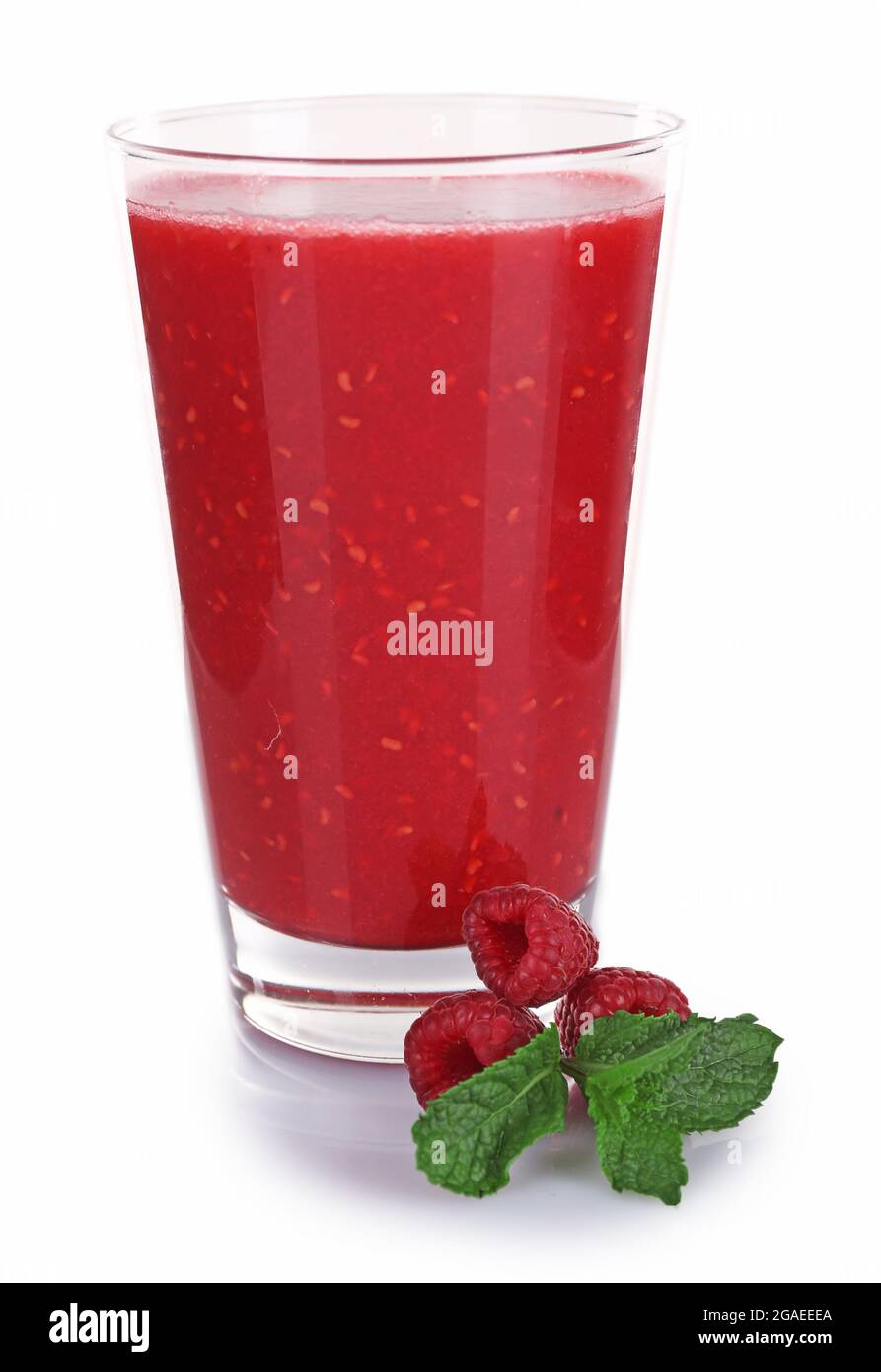 Glass of fresh raspberry cocktail and raspberries isolated on white ...