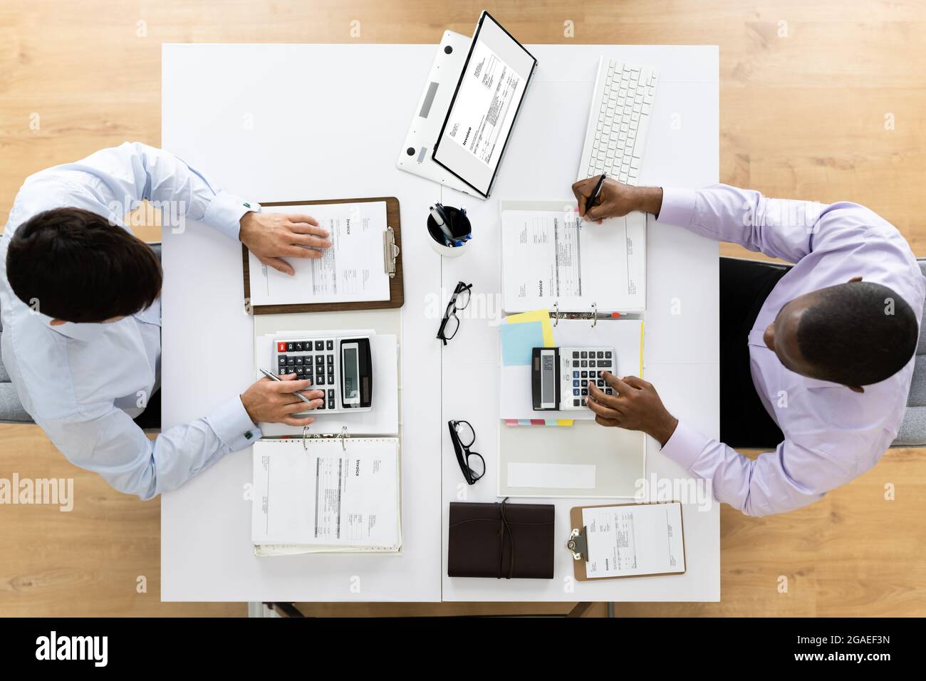 Tax Accountant And Auditor With Receipts. Overhead View At Desk Stock ...