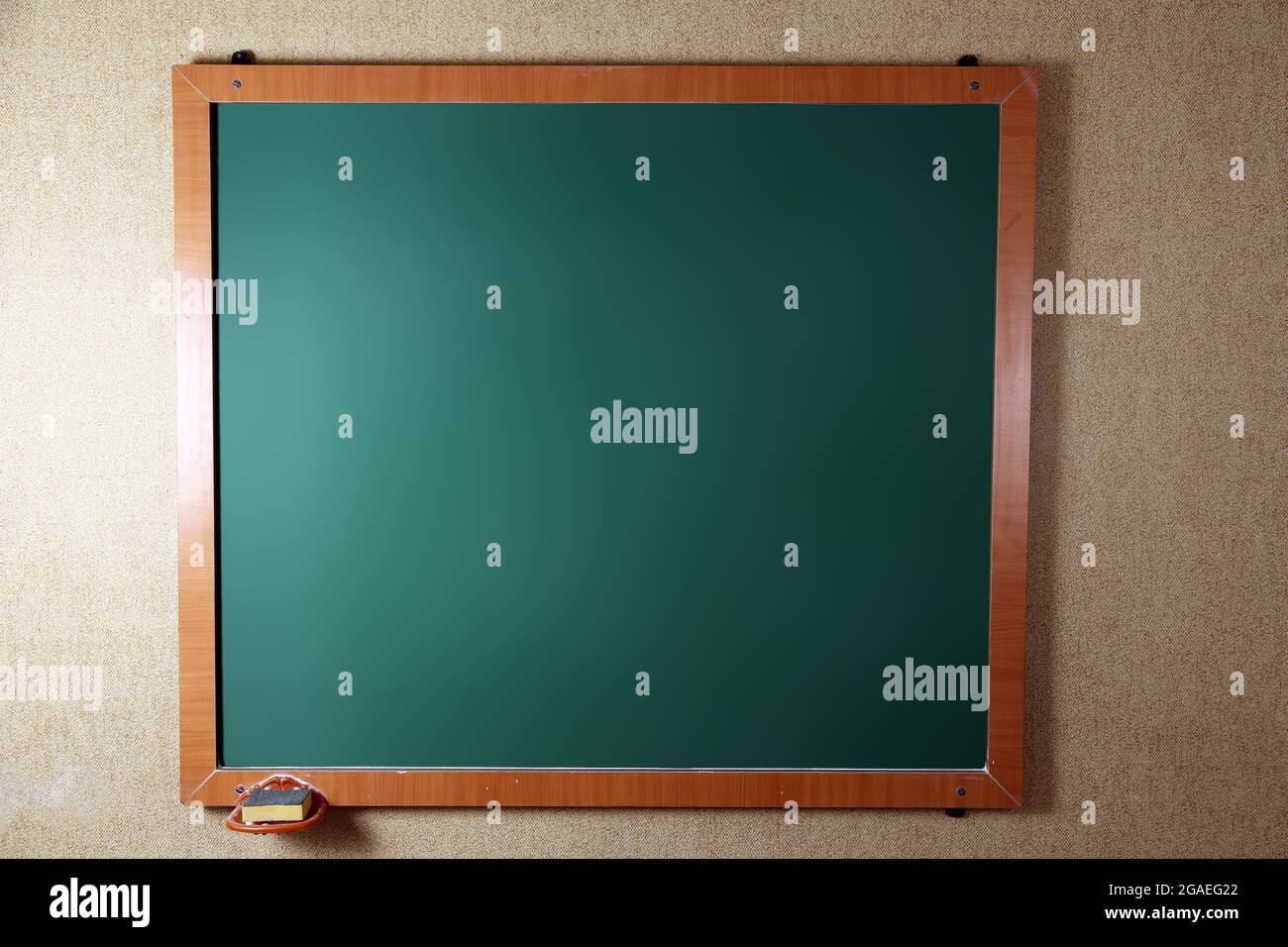 Blackboard on wall, close up Stock Photo - Alamy