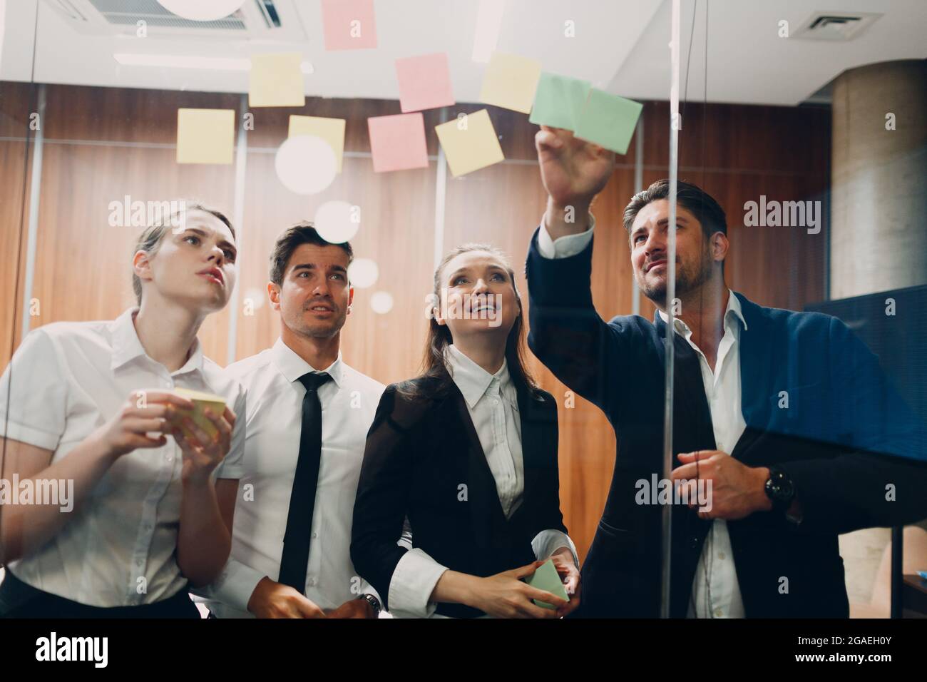 Woman sticky notes glass hi-res stock photography and images - Alamy