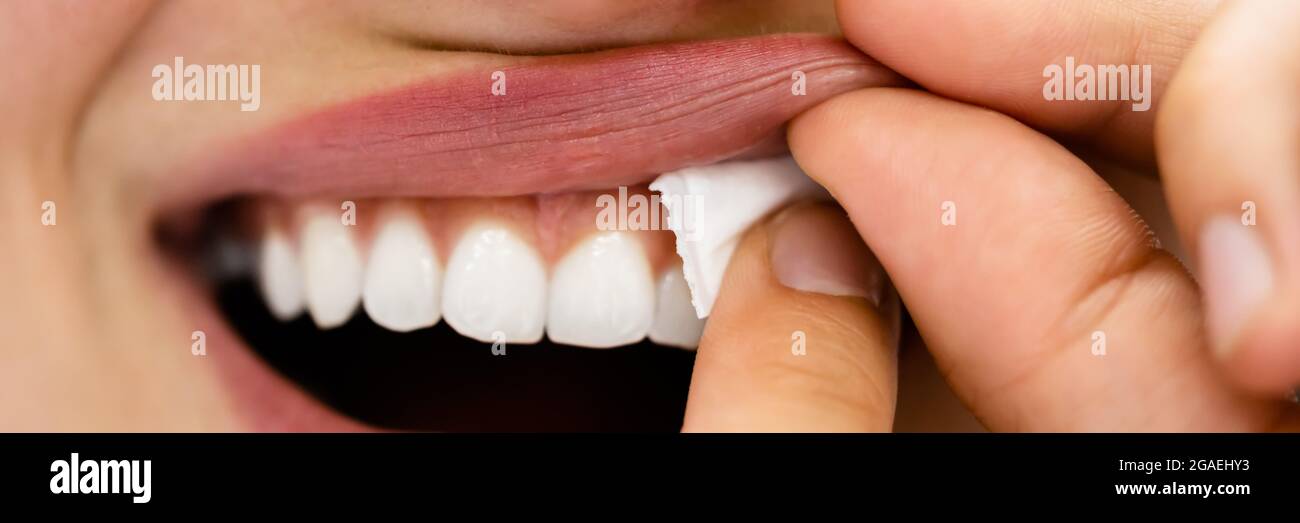 Woman Chewing Wet Moist Nicotine Tobacco Snus Product Stock Photo - Alamy