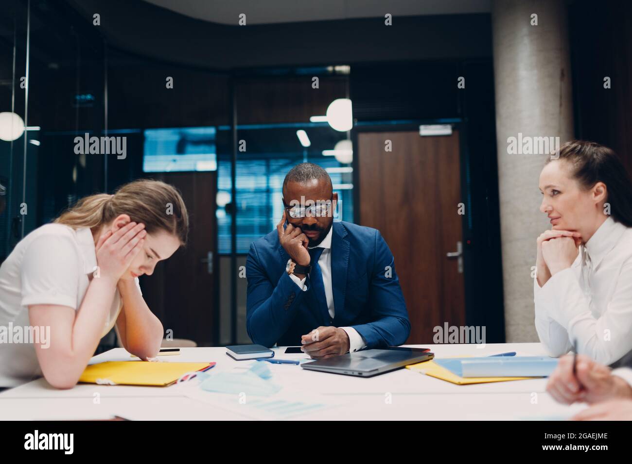 Group people sad hi-res stock photography and images - Alamy