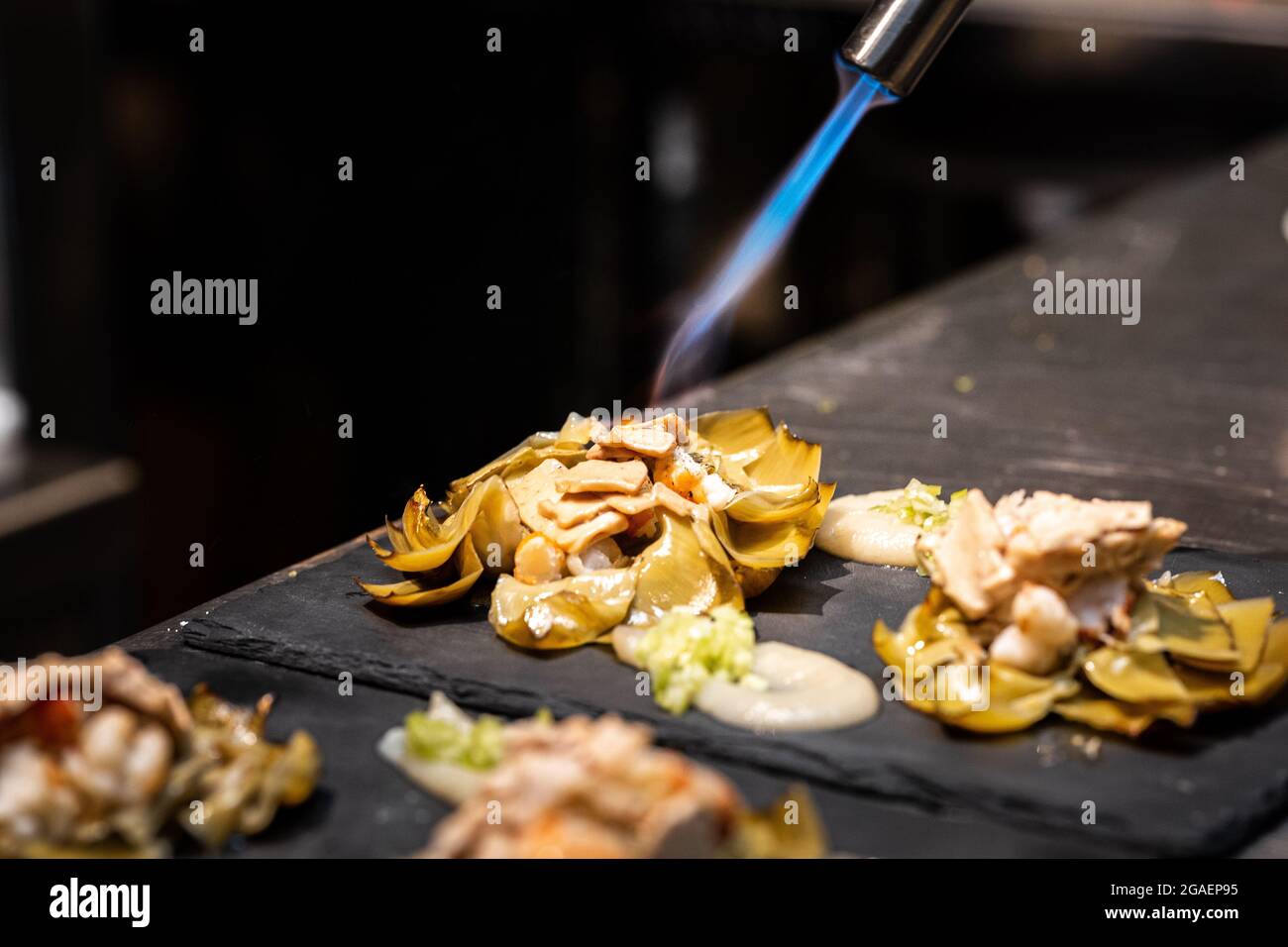 Restaurant dishes being prepared to serve Stock Photo - Alamy