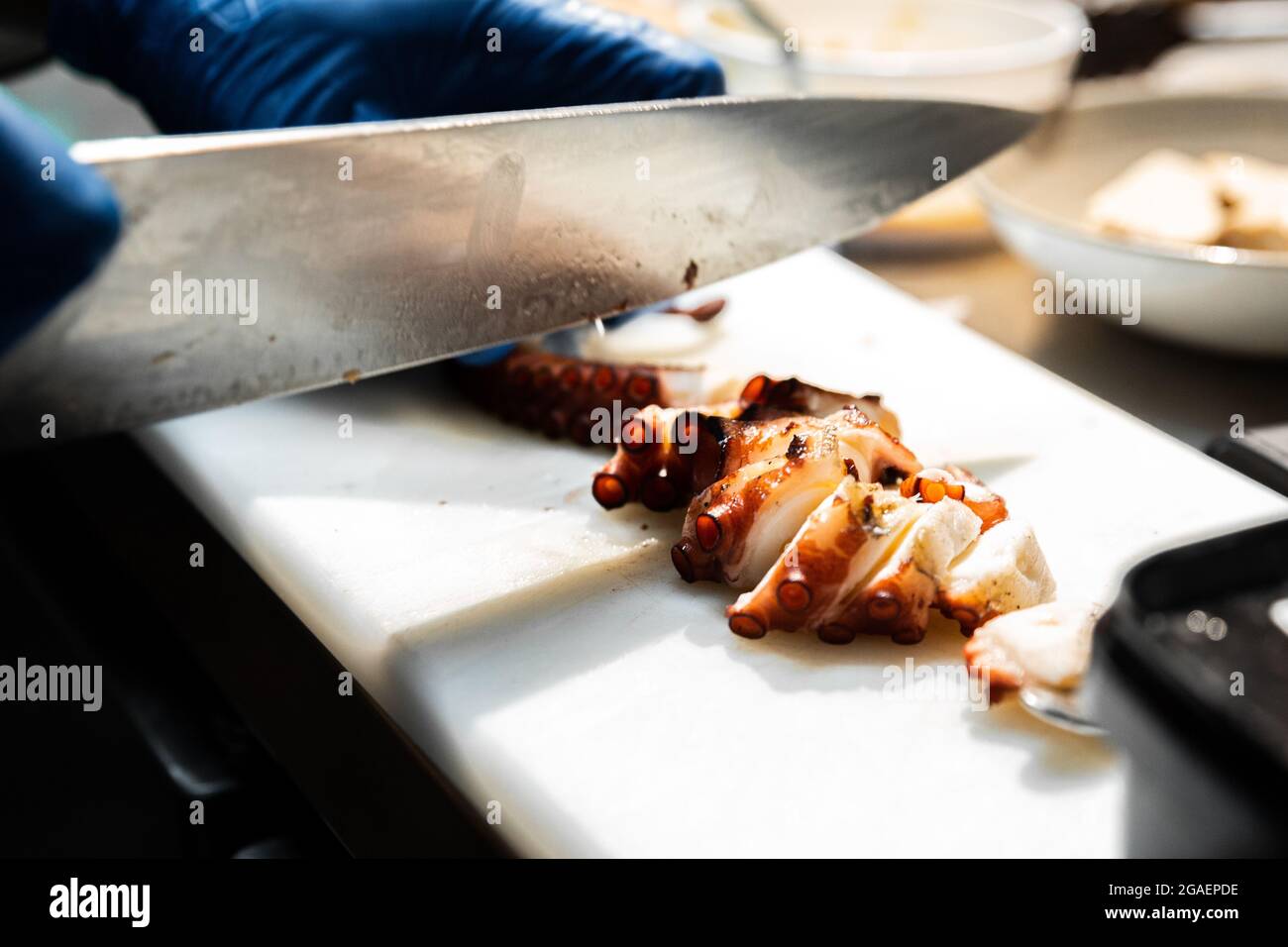 Seafood dish being prepared by a chef Stock Photo - Alamy