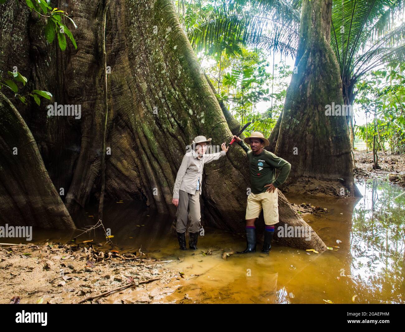 Jungle, Brazil - May 6, 2016: People in the Amazon jungle next to the ...