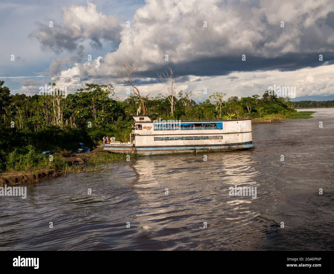 Amazon River, Peru - May , 2016 : View of the big wooden boat on bank ...