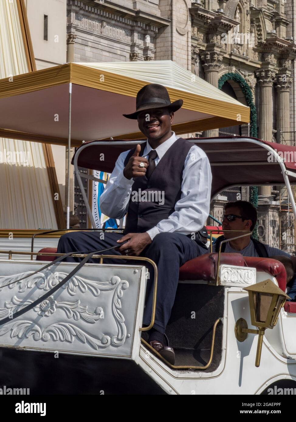 Lima, Peru - May 2016: Coachman (carriage driver) greets tourists from ...