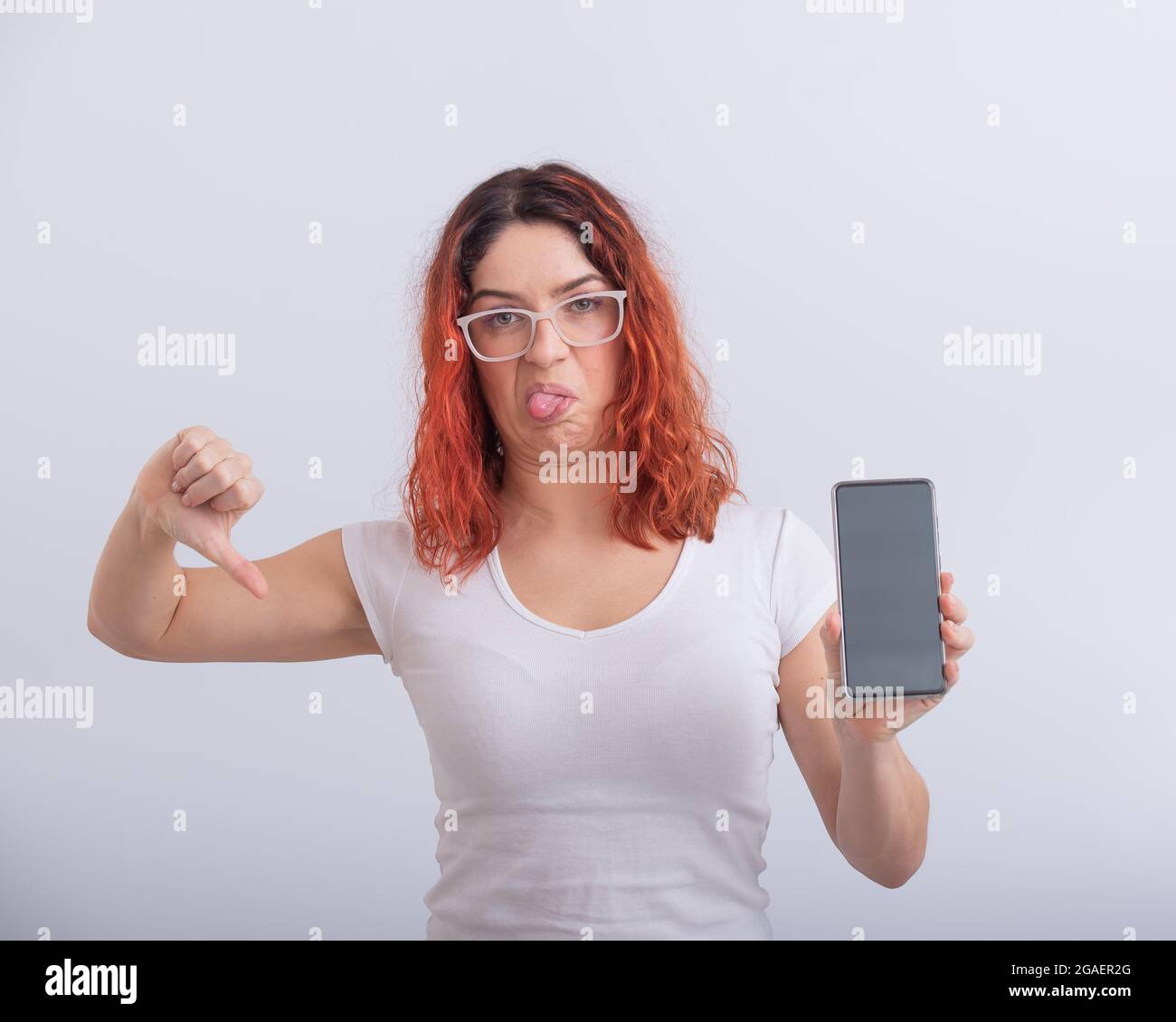 Hand holding phone down disappointed hi-res stock photography and ...