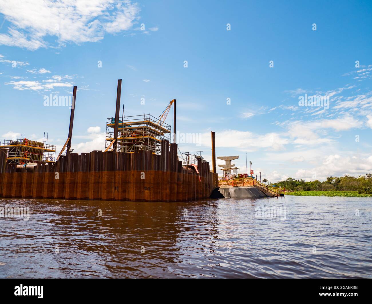 Iquitos, Peru - Dec 2019: Construction of a bridge over the river Nanay ...