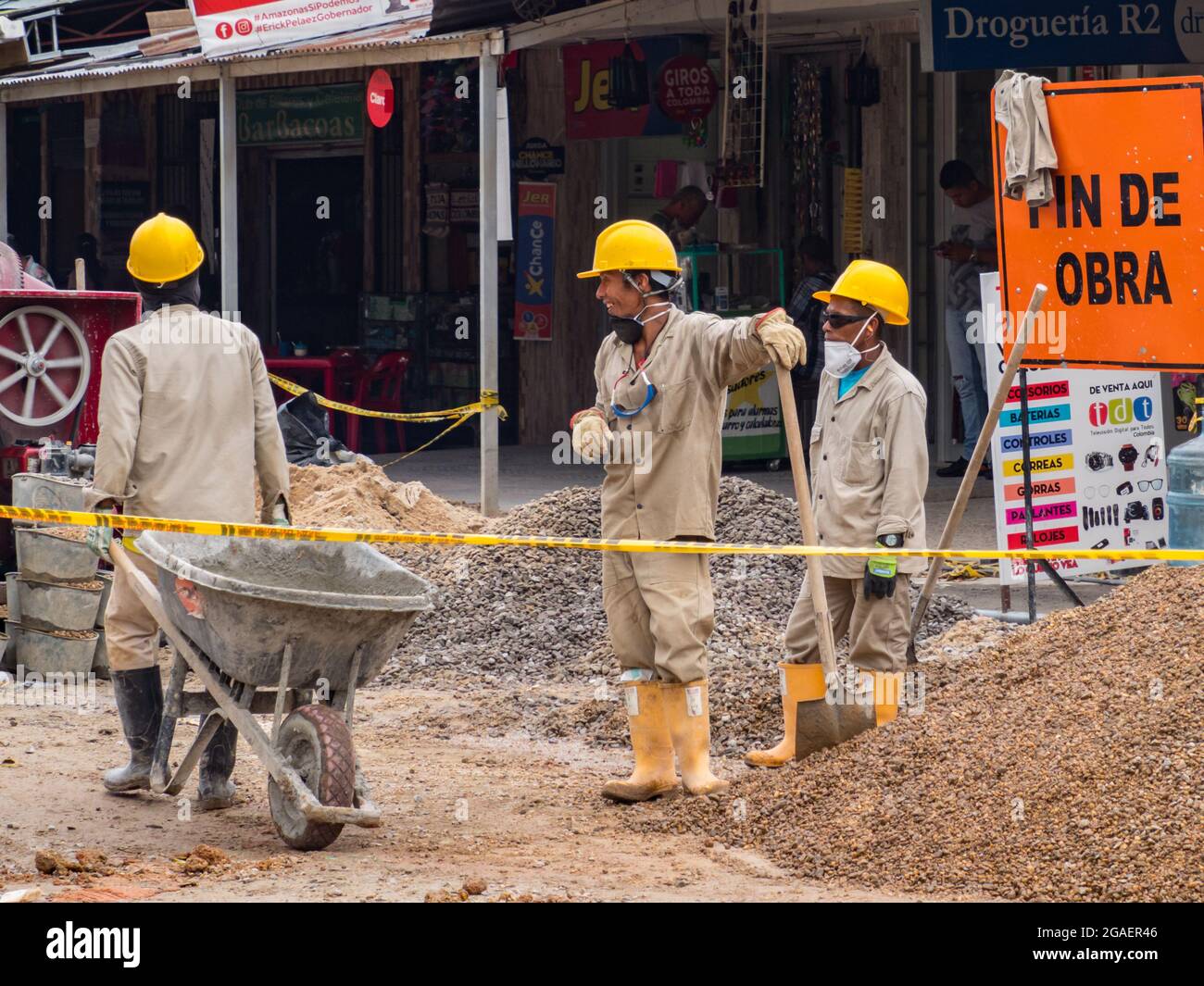 Leticia, Colombia - Dec 2019: Workers in helmets during the ...