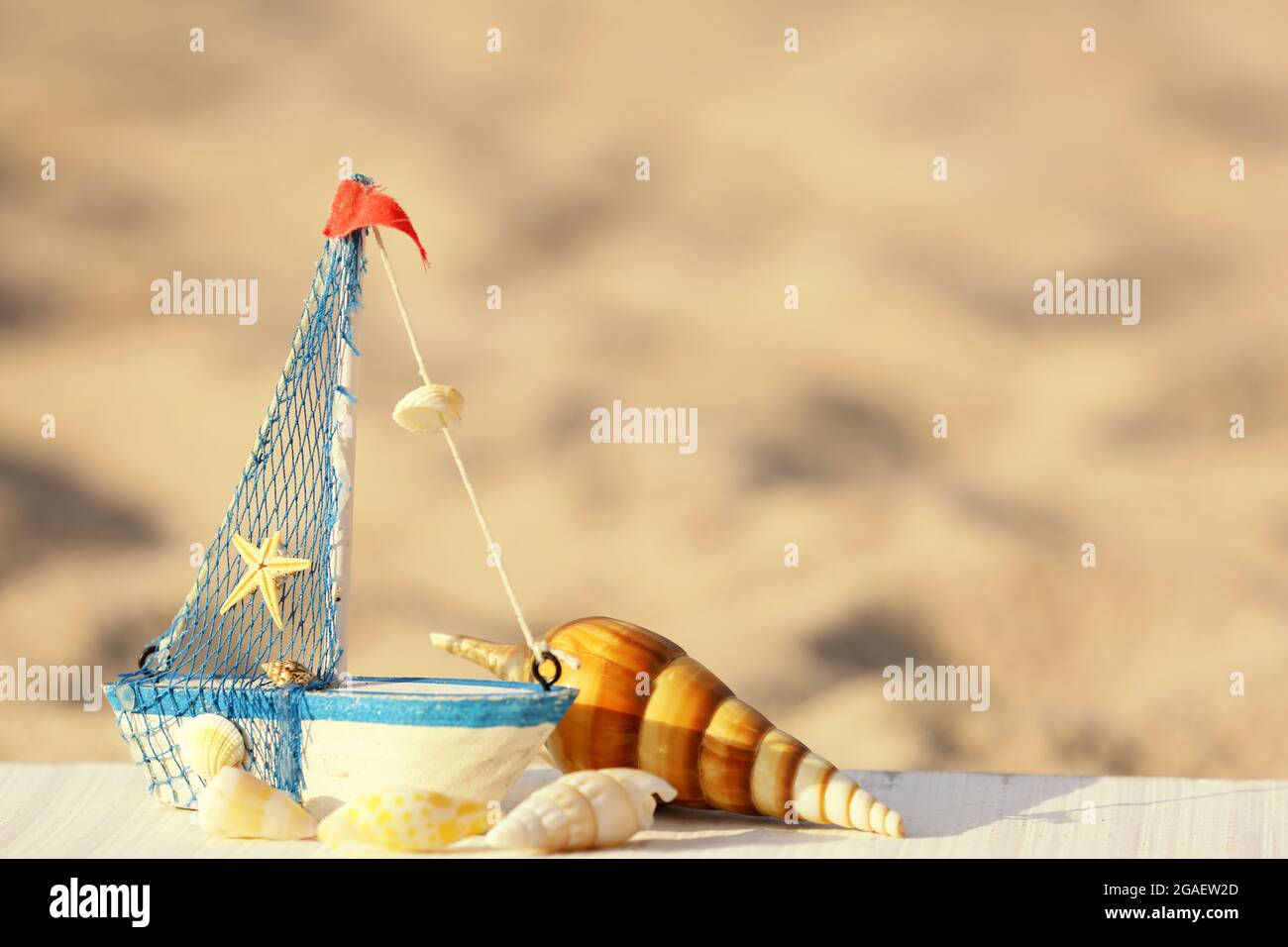 Beautiful sea composition with ship on sand beach background Stock ...