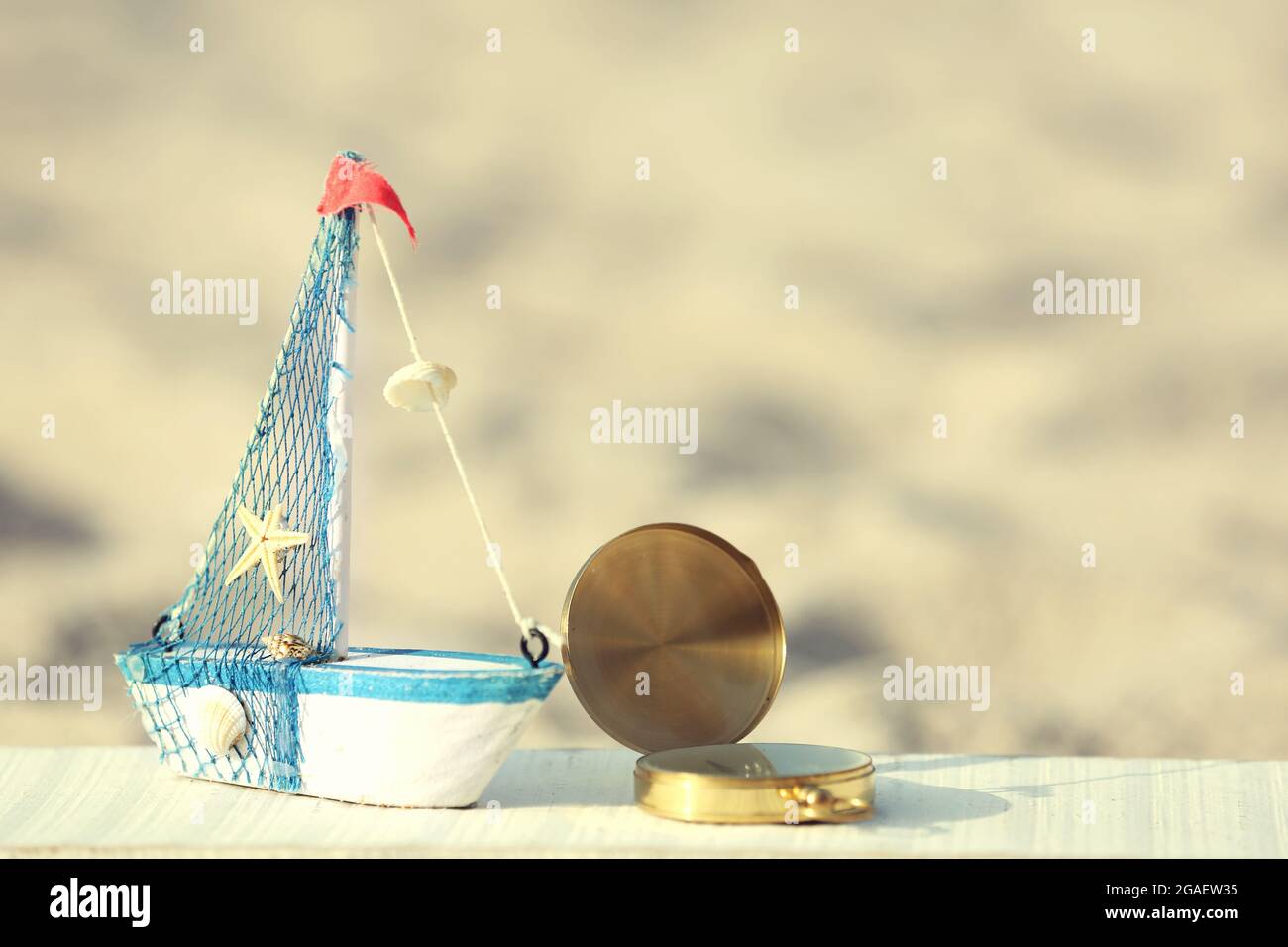 Beautiful sea composition with ship on sand beach background Stock ...