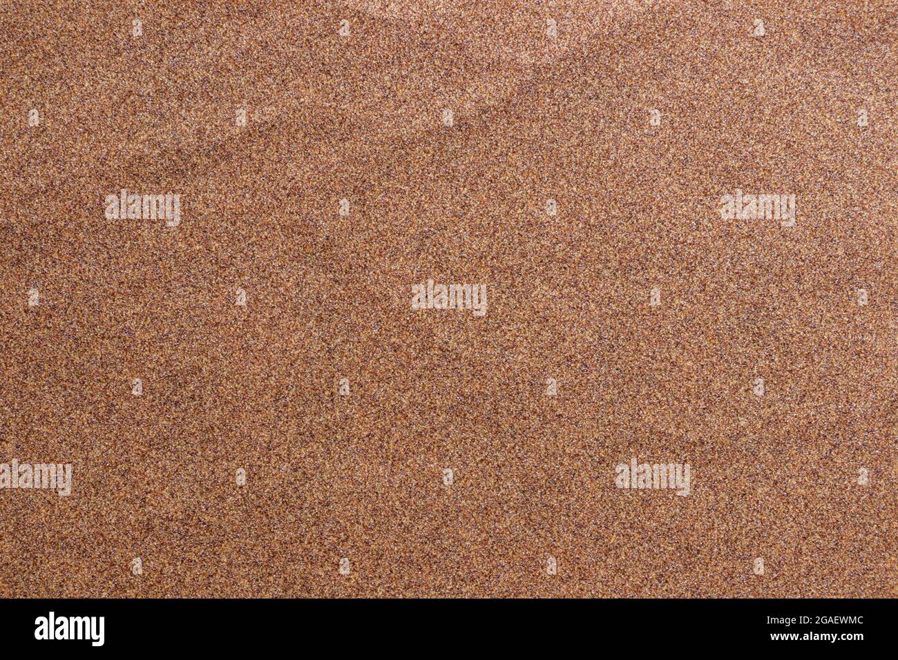 Sandpaper texture background where you can see the red-brown sand grain ...