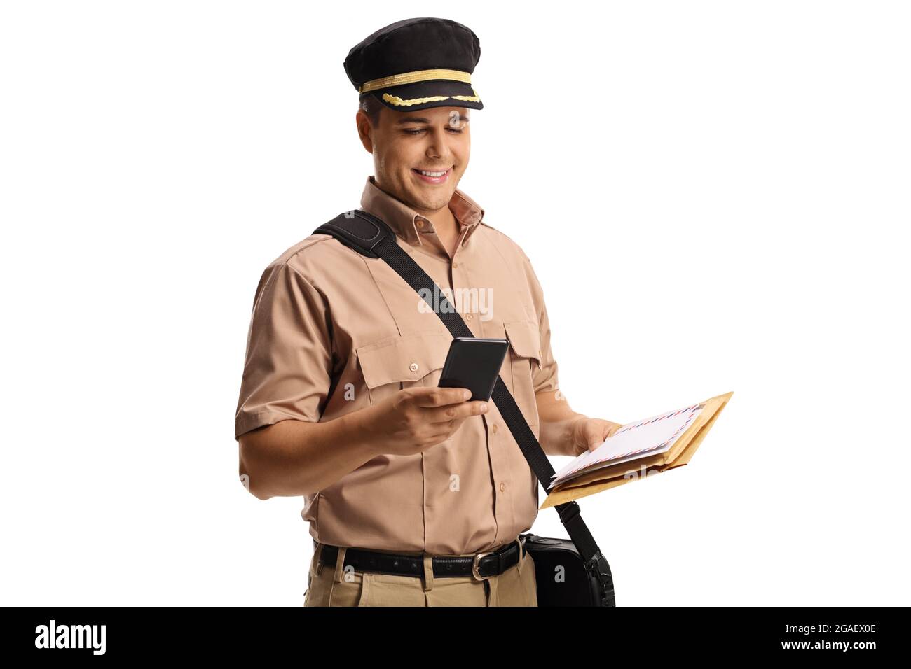 Mailman using a mobile phone and holding letters isolated on white ...
