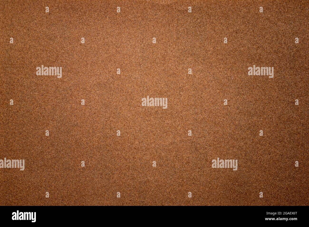 Sandpaper texture background where you can see the red-brown sand grain ...